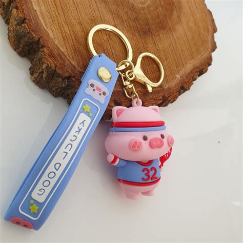 قیمت و خرید جاکلیدی مدل سیلیکونی طرح خوک بچه تپل و تنیس کد Db20