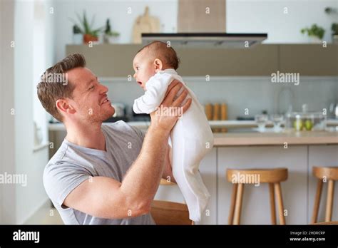 Baby Father Lifting Babe Babies Human Babies Dad Fathers Stock Photo Alamy