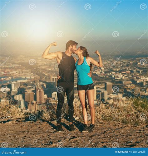 Man Woman And Kiss Or Flex In Outdoor On Mountain With City Background
