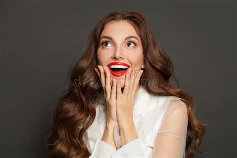 Happy Surprised Woman With Cute Toothy Smile With White Teeth Looking