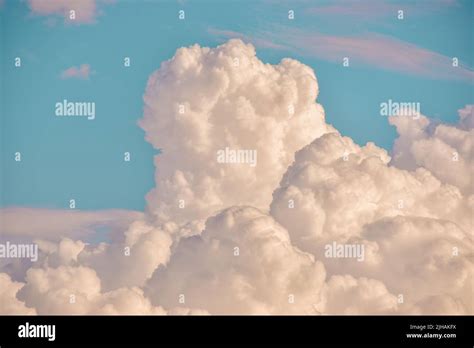 An Aesthetic Wallpaper With Fluffy Big Clouds In The Blue Sky Stock