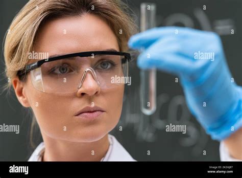 Scientist Inspecting Substance Inside The Test Tube In A Laborat Stock Photo Alamy