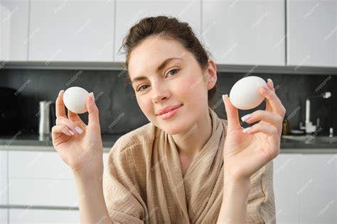 Free Photo Attractive Young Cheerful Girl Baking At The Kitchen Making Dough Holding Recipe