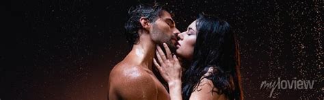 Side View Of Sexy Brunette Woman And Shirtless Man Kissing With Posters