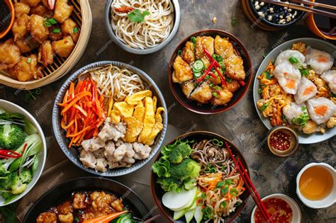 Premium Photo High Angle Of Assortment Of Asian Food On Table