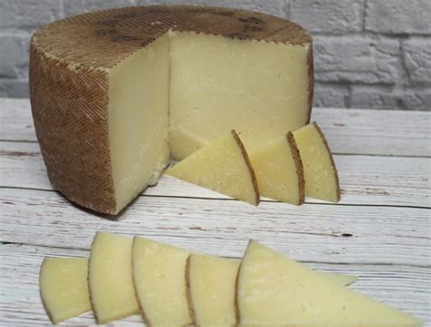 Cheese Pecorino Romano Whole Wheel 60lb Avg Imported — Delizie Foods