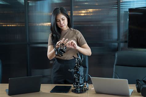 Asian Female Engineer Working With Ai Robot Arm System Female Engineer