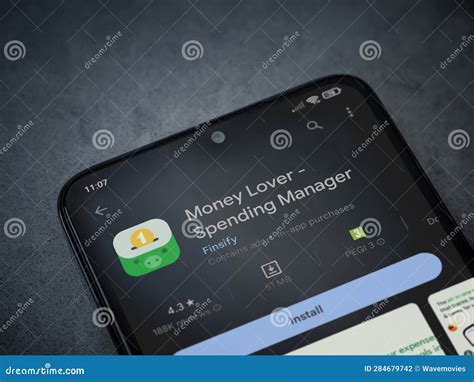 Money Lover App Play Store Page On Smartphone On A Dark Marble Stone Background Editorial