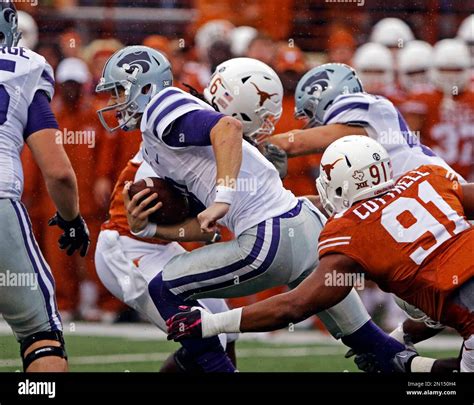 Kansas State Quarterback Joe Hubener Runs The Ball Against Texas Lineman Bryce Cottrell 91