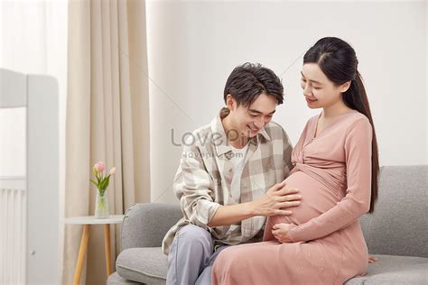 Husband Gently Caressing His Wifes Pregnant Belly Picture And Hd Photos