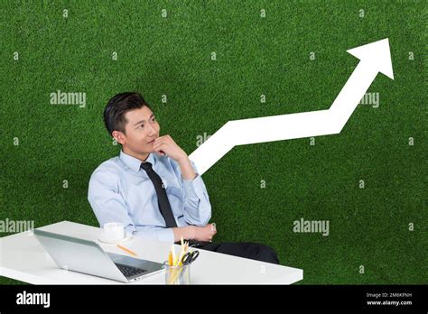 The Grass Business Men To Use Notebook Computer Stock Photo Alamy