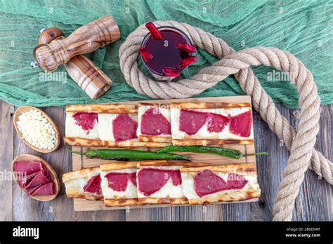 Turkish Style Pide With Long Roasted And Pastrami Pita Baked In Stone