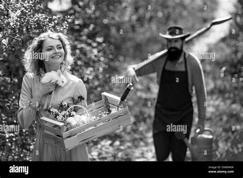 Egg Hunt Beautiful Young Woman With Bunny Rabbit On Farm Happy Easter