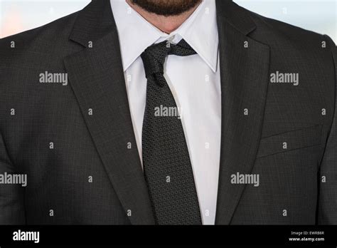 Close Up Of Businessman Adjusting Tie Stock Photo Alamy