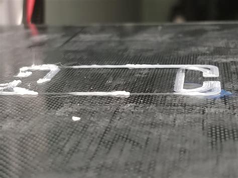 Anyone know what these blobs on the first layer are? (KP3S PRO - PLA - 220c nozzle - 60c bed ...
