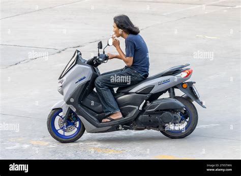 Samut Prakan Thailand Nov 03 2023 A Young Man Is Riding A Motorcycle
