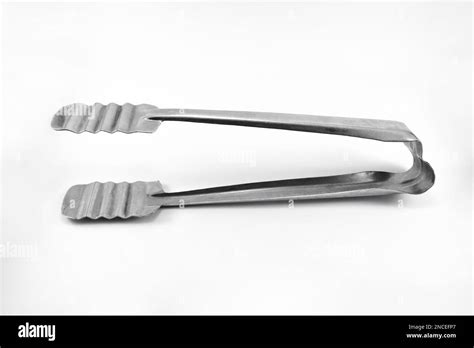 Stainless Steel Food Tongs Isolated On White Background Serving