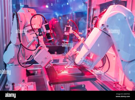 Robotic Arm Catch For Electronic Assembly Line The Robot For Smart Technology Manufacturing