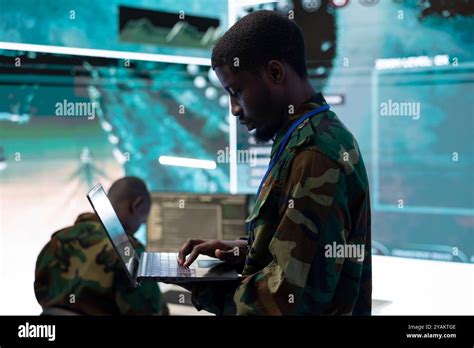 Serviceman Coordinating Army Recruits For A Complex Military Operation Ensuring All Troopers