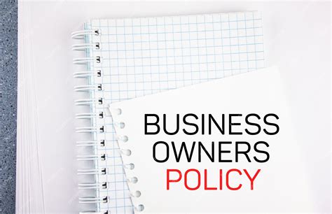 Premium Photo Business Owners Policy Text Concept On Notepad Sheet Business Concept