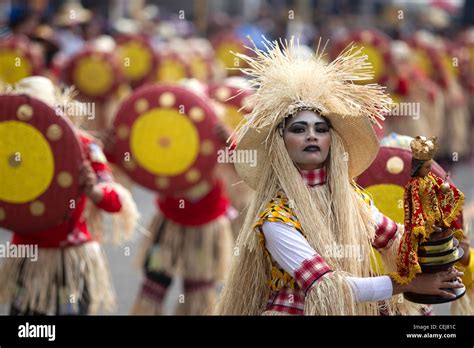 Lead Dancer Performs Street Dance Routine Holding Santo Nino Sinulog