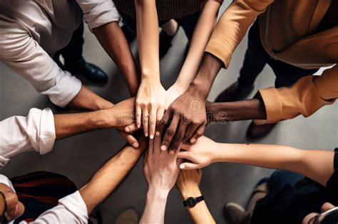 Business Teamwork Ethnically Diverse Team Putting Their Hands Together