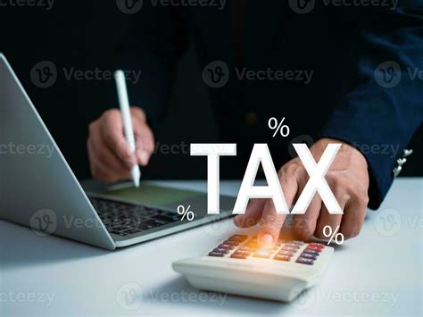 Businessman Using Computer And Calculator For Tax Calculation Online Personal Tax Return Form