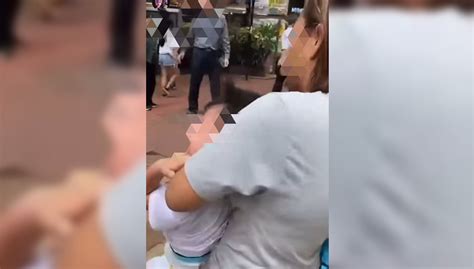 Inaresto Ang Ofw Sa Viral Video Na Tumatawid Ng Kalye Hawak Ang Alagang Bata Hkpinoytv