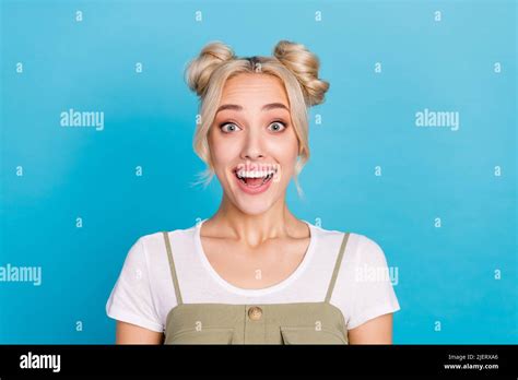 Photo Of Impressed Blond Buns Hairdo Lady Look Camera Wear T Shirt