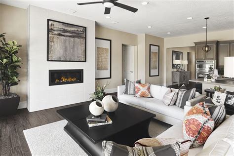 Cozy Fireplace And Eye Catching Accessories Julia Model Home Great Room