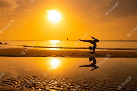 Premium Photo Asian Girl Practice Yoga On The Beach Sunrise Morning Day