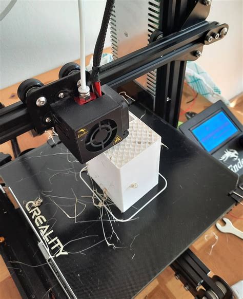stringing and discolored blobs print is otherwise fine help r
