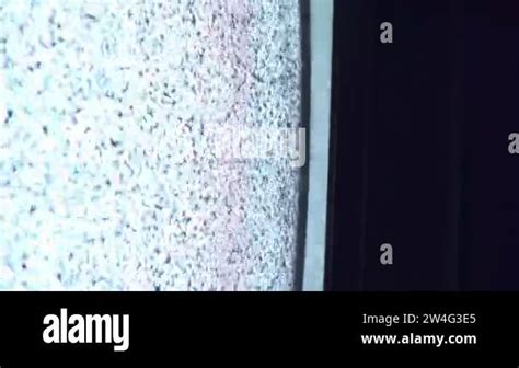 Man Touching TV Screen With Static Noise In Dark Room Stock Video Footage Alamy