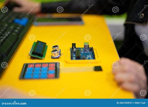 Engineers Assemble Electrical Circuits From Radio Components In A