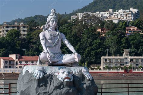 Statue Of Shiva Hindu Idol Near Ganges River Water Rishikesh India