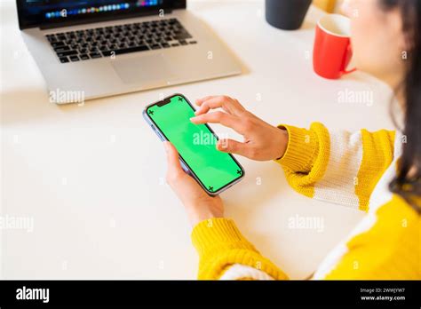 Close Up Unrecognizable Woman In A Sweater Working In Using A Blank
