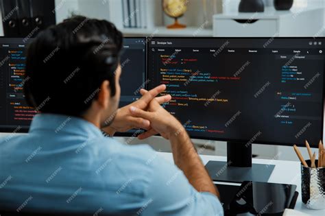 Premium Photo Concentrating In Smart It Developer Working Coding On Two Pc Screen Surmise