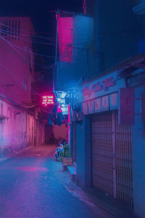 Download Luminous Blue And Pink Neon Signage Wallpaper