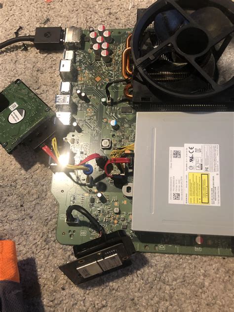 I Was Trying To Fix This Broken Xbox Console But When I Opened It The Red Wire For The Blue Ray