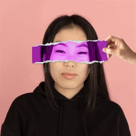 Attentive Concentrated Look Asian Beautiful Young Woman And Human Hand Covering Eyes With Photo