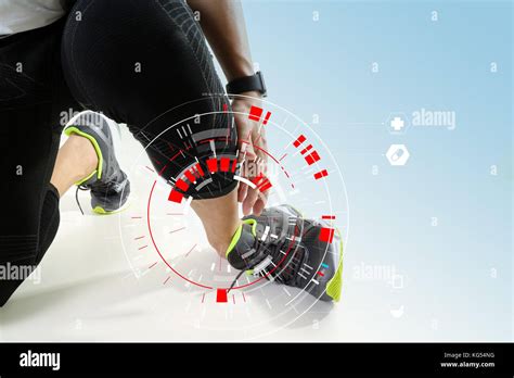 Runner Sportsman Holding Ankle In Pain With Broken Twisted Joint