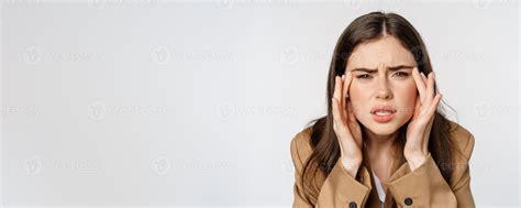 Close Up Portrait Of Business Woman Squinting And Looking Without