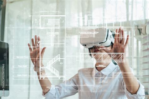 Asian Woman Architect Or Engineer Wearing Vr Headset For Hologram Blueprint Detail Working With