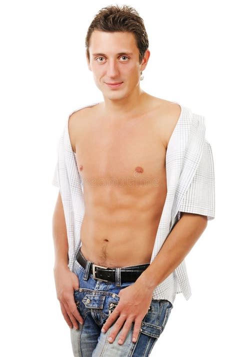 Portrait Des Reizvollen Jungen Mannes In Der Blue Jeans Stockbild