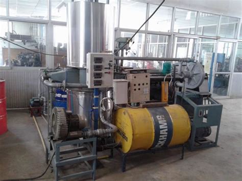 Solid Fuel Porous Medium Combustor With Gas Cyclic Reversal Flow