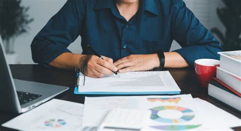 A Young Female Of Banking Manger Using Calculator Computer Laptop