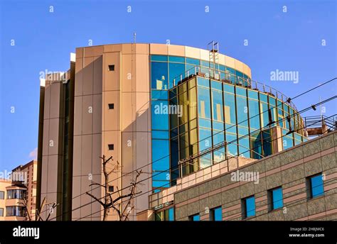 Modern Business House With Metallic Facade Cladding And Big Panel Solid