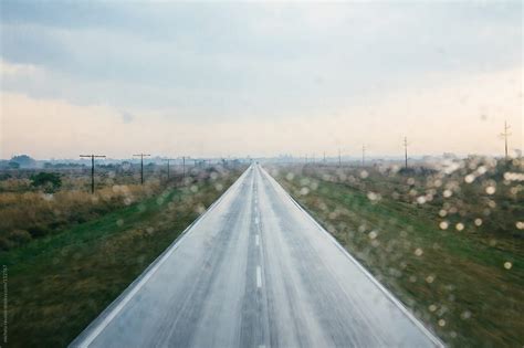The Road Through An Wet Glass By Stocksy Contributor Michela Ravasio