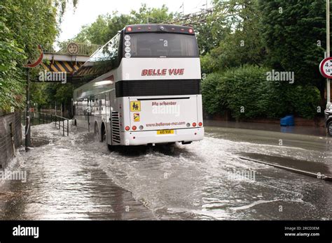 Bus Driving Through Flood Water On Crossley Road During Storm