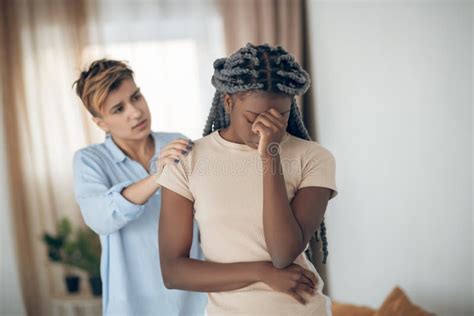Same Sex Couple Having An Argument And Looking Unhappy Stock Photo Image Of Adult Unsatisfied